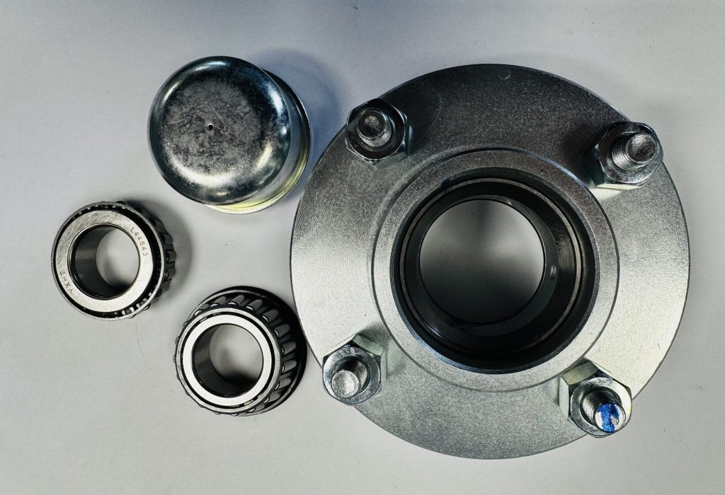 COMPLETE HUB 1″ TAPER ROLLER 4×4″ PCD – Mersea Trailers